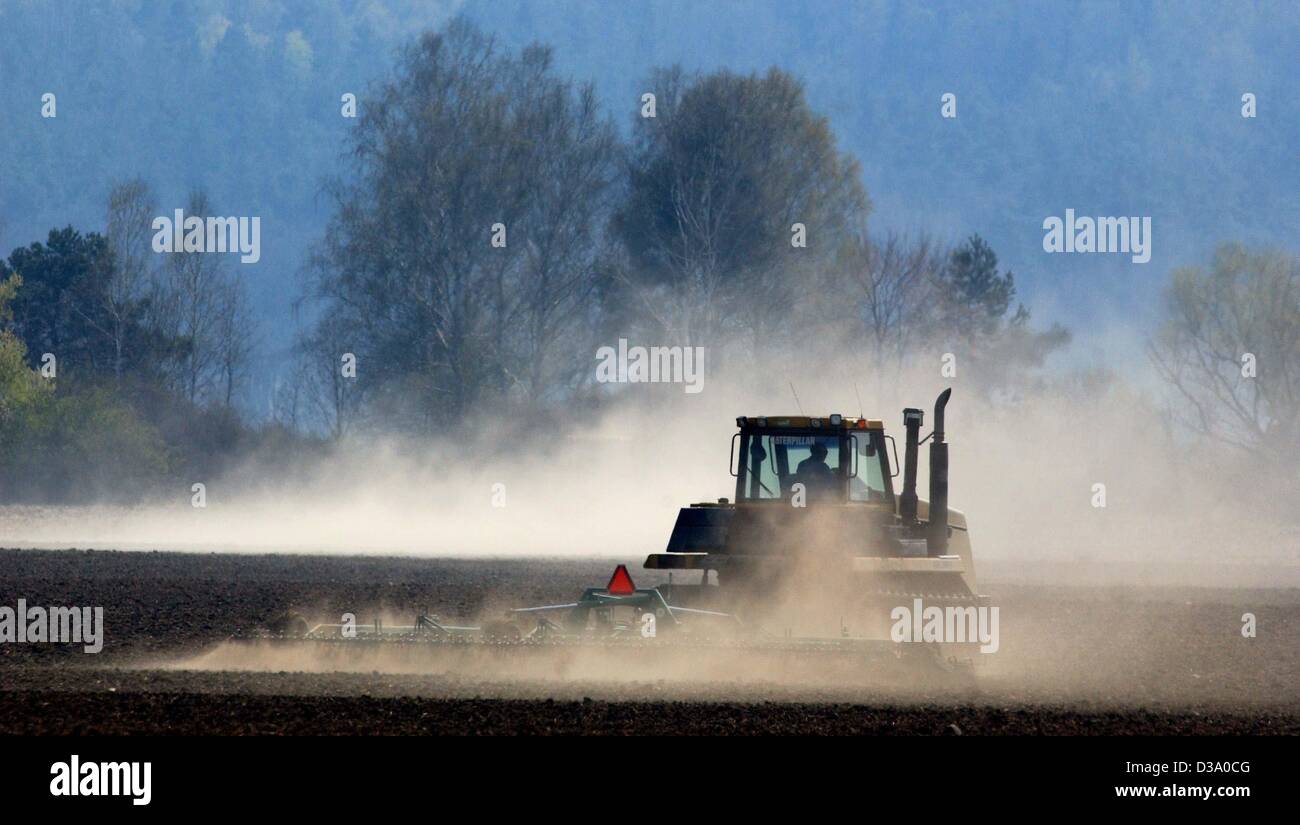 Labour lab agriculture farming field dust tractor germany hi-res stock ...