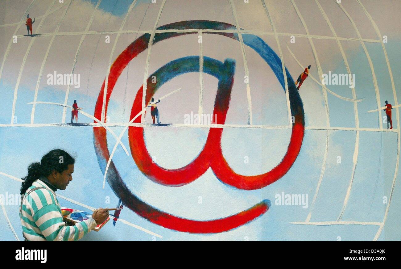 (dpa) - An artist is painting a universal grid around the internet sign ...