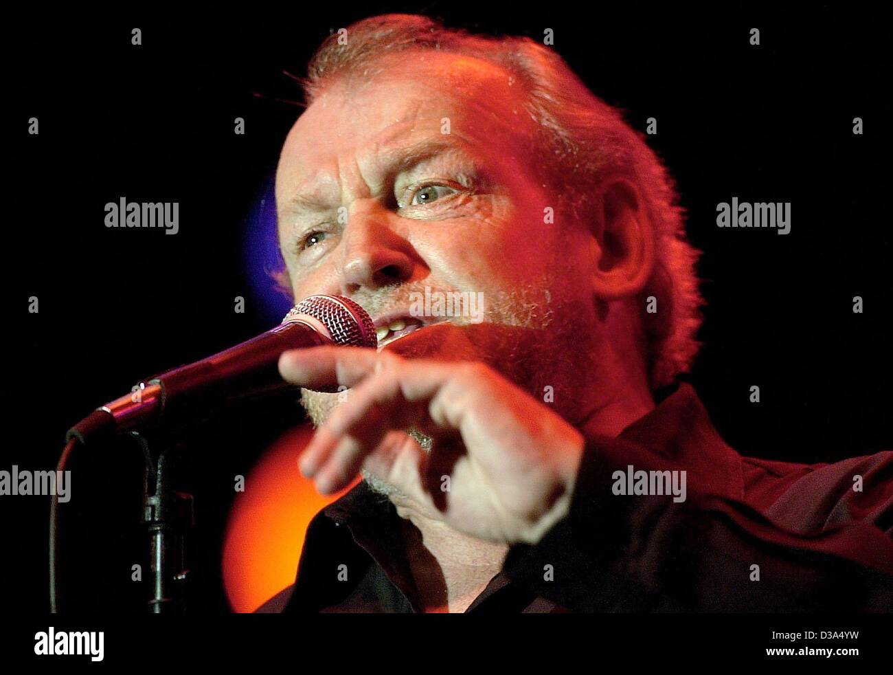 (dpa) - US rock legend Joe Cocker performs on the open-air stage at a ...
