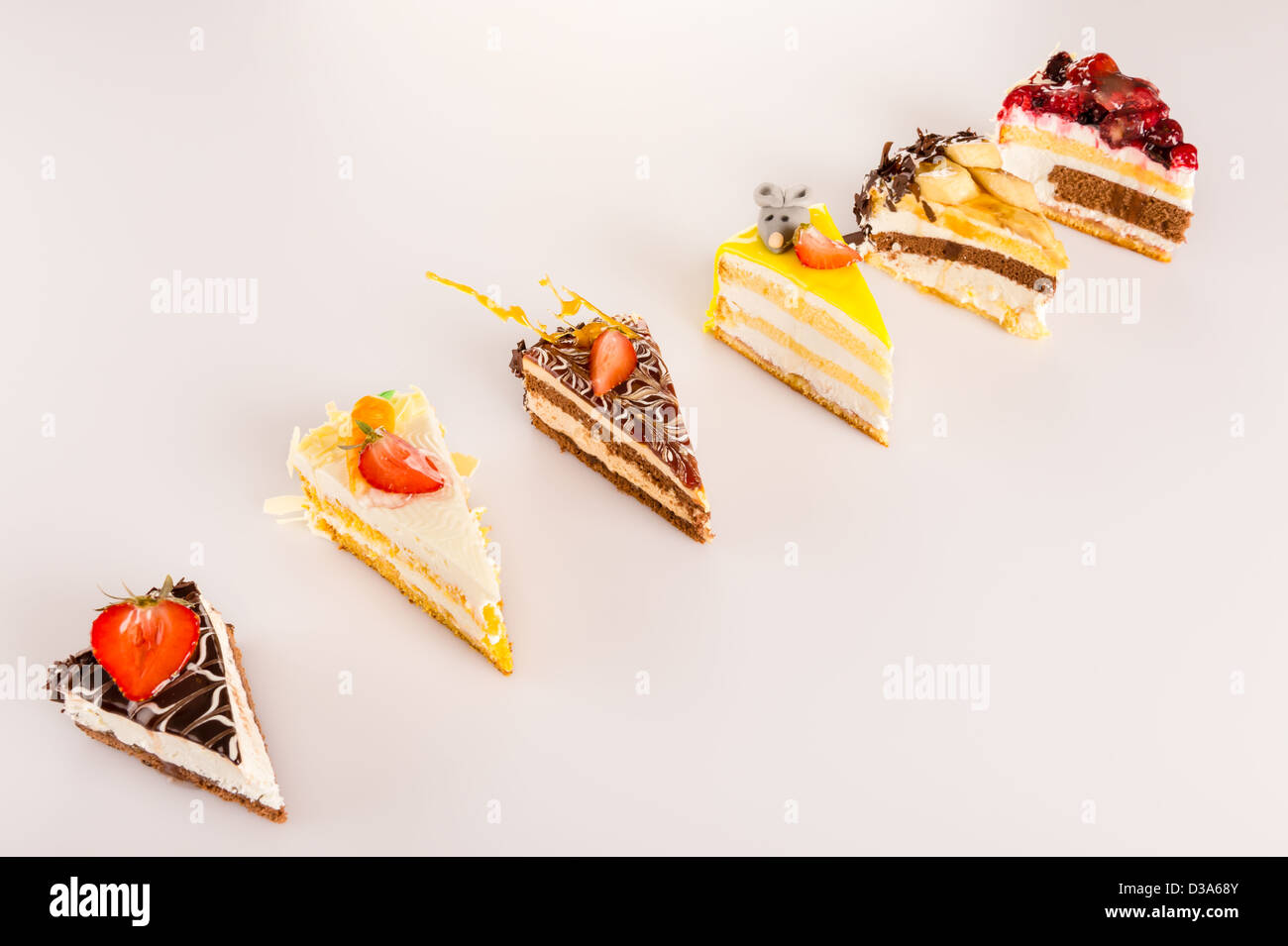 Choice of petite cakes delicious dessert selection display sweet tarts ...