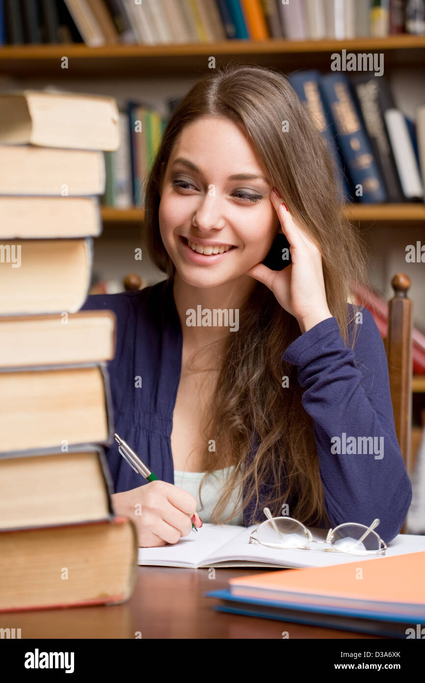 Portrait of happy smiling young brunette student girl Stock Photo - Alamy