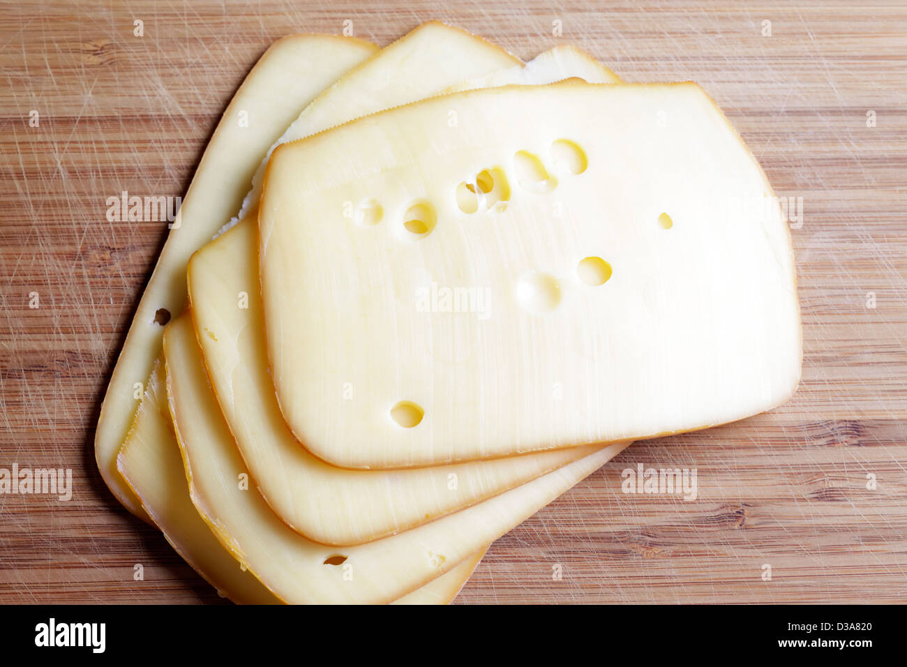 Thin slice yellow cheese hi-res stock photography and images - Alamy
