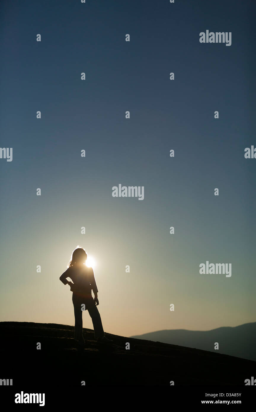 Girl looking out from mountain top hi-res stock photography and images ...