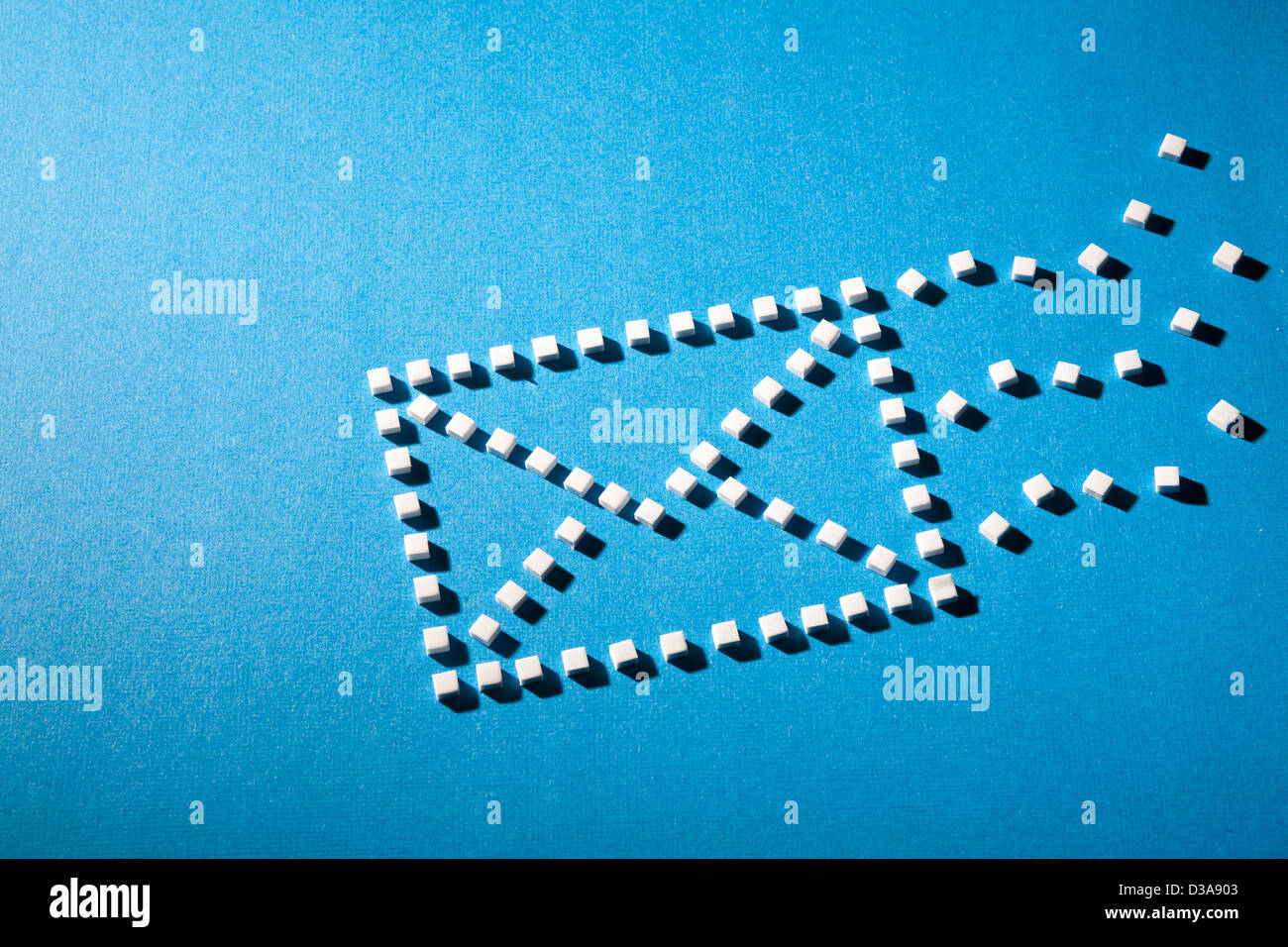Sugar cubes in envelope shape Stock Photo - Alamy