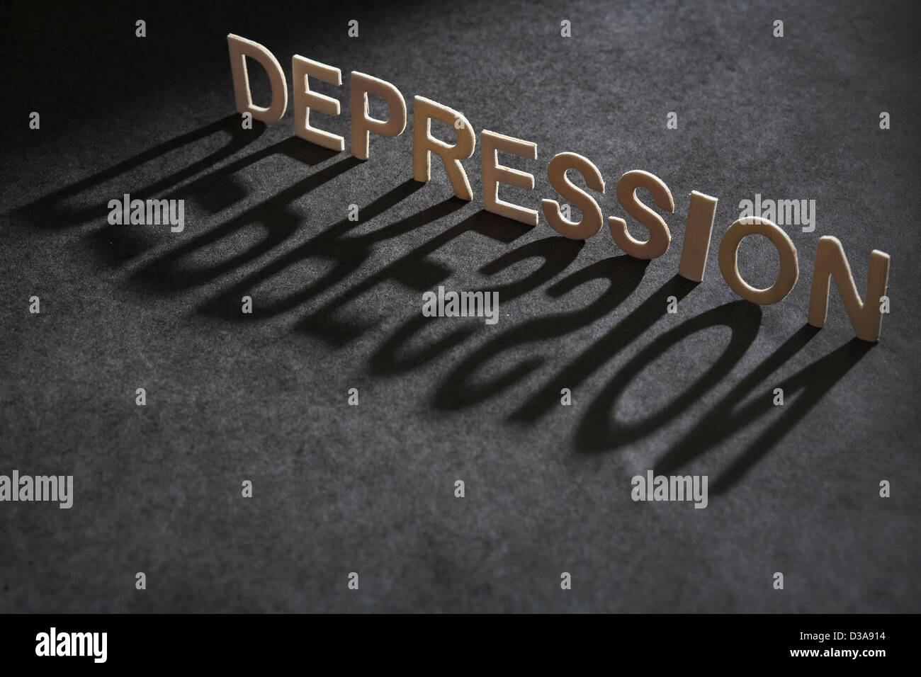 Depression letters casting shadow Stock Photo - Alamy