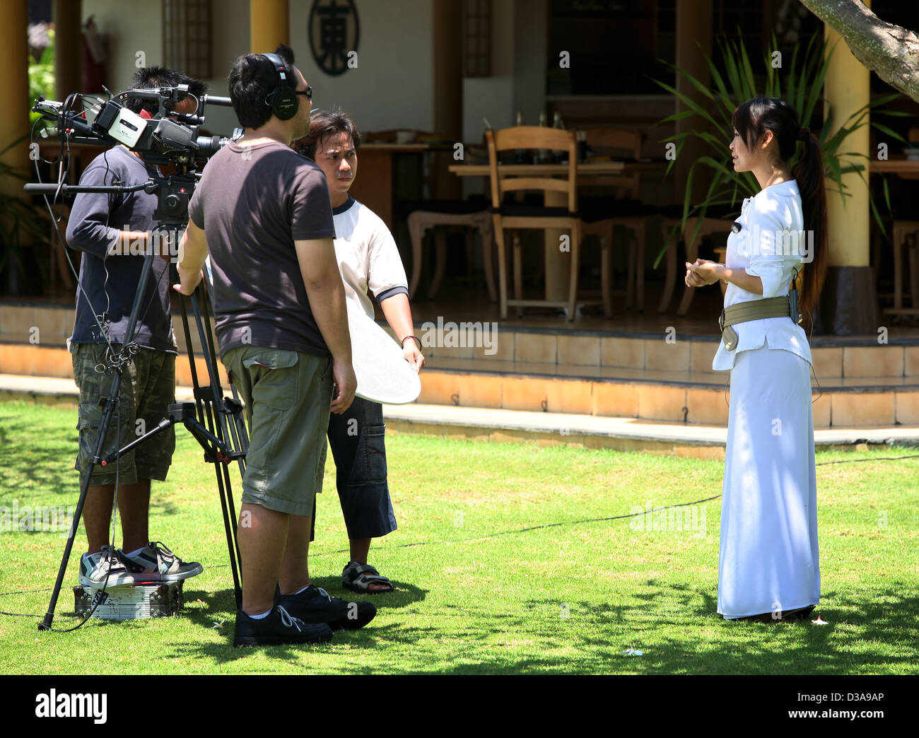 Indonesia, Bali 22 October: TV reporter presenting the news about Bali ...