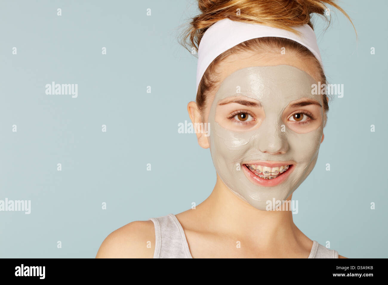 Smiling girl wearing face mask Stock Photo - Alamy
