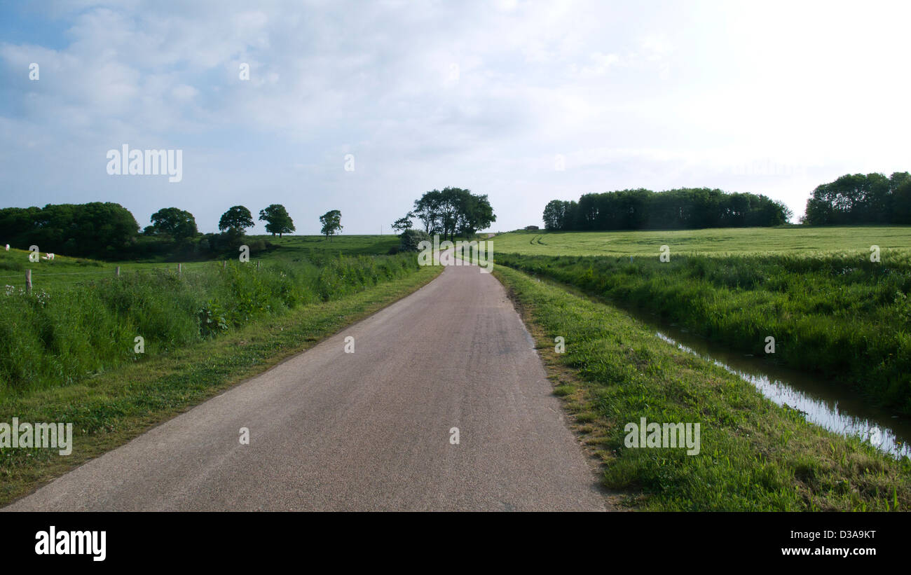 Deserted winding country road hi-res stock photography and images - Alamy