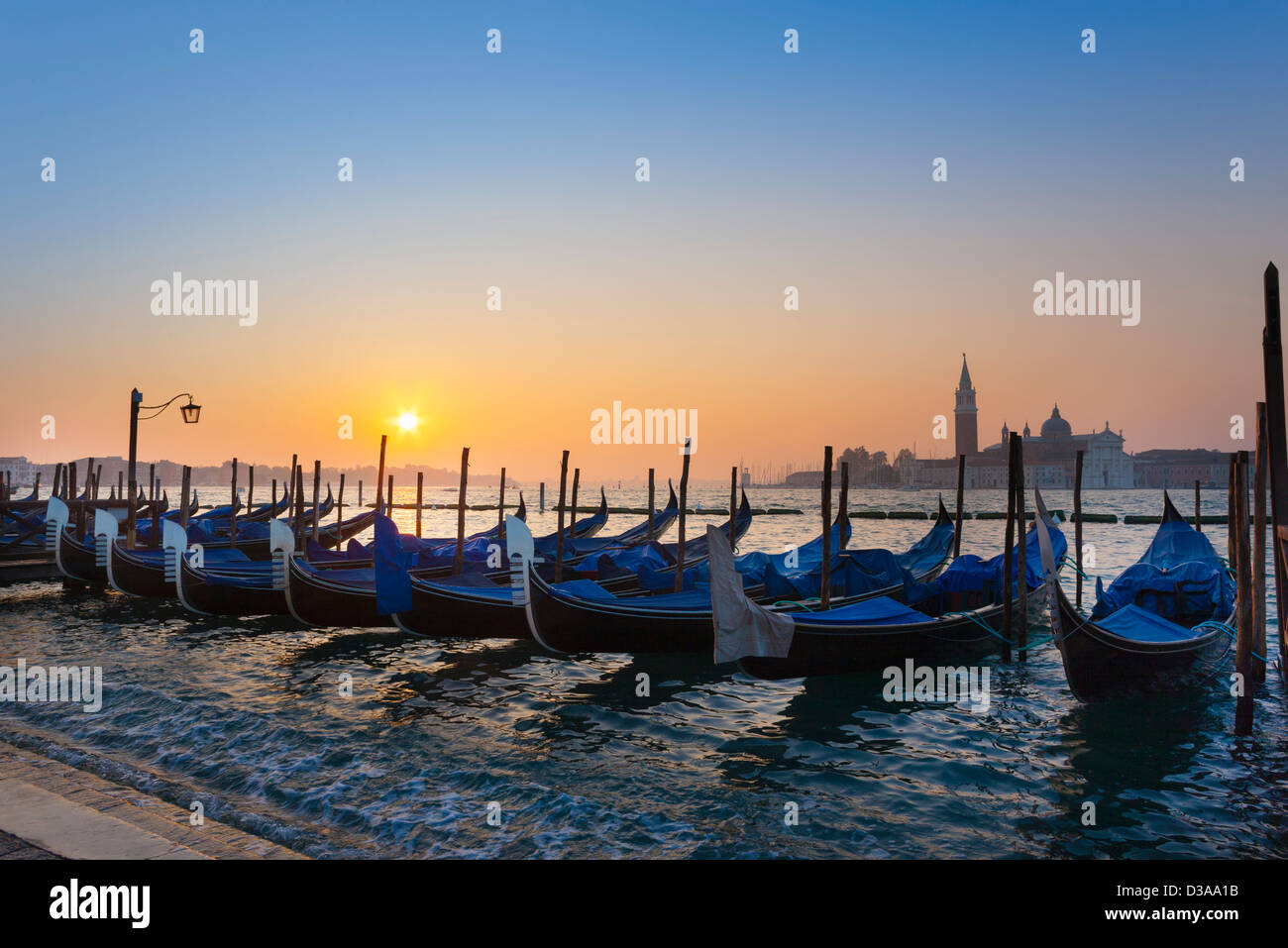 Rowboats docked in harbor Stock Photo - Alamy