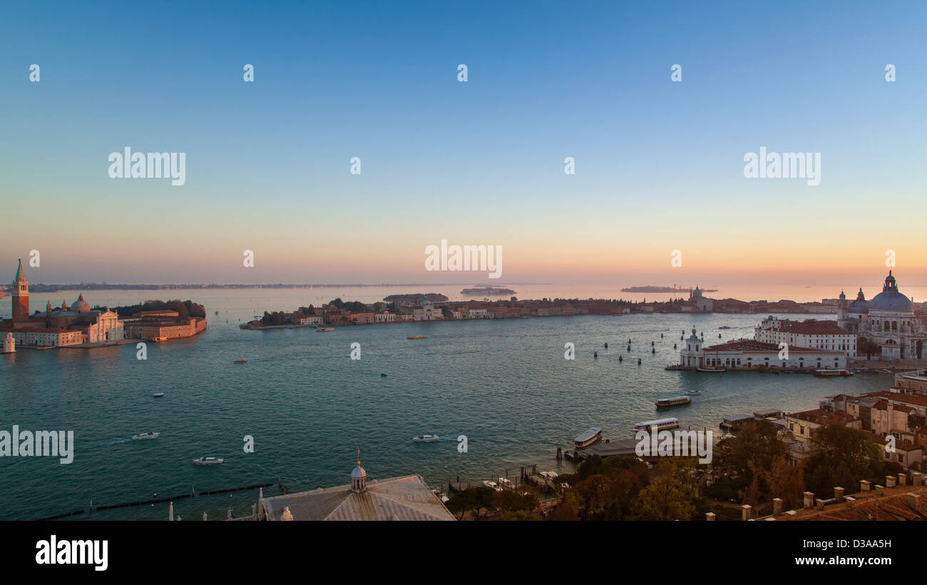 Buildings on islands in urban harbor Stock Photo - Alamy