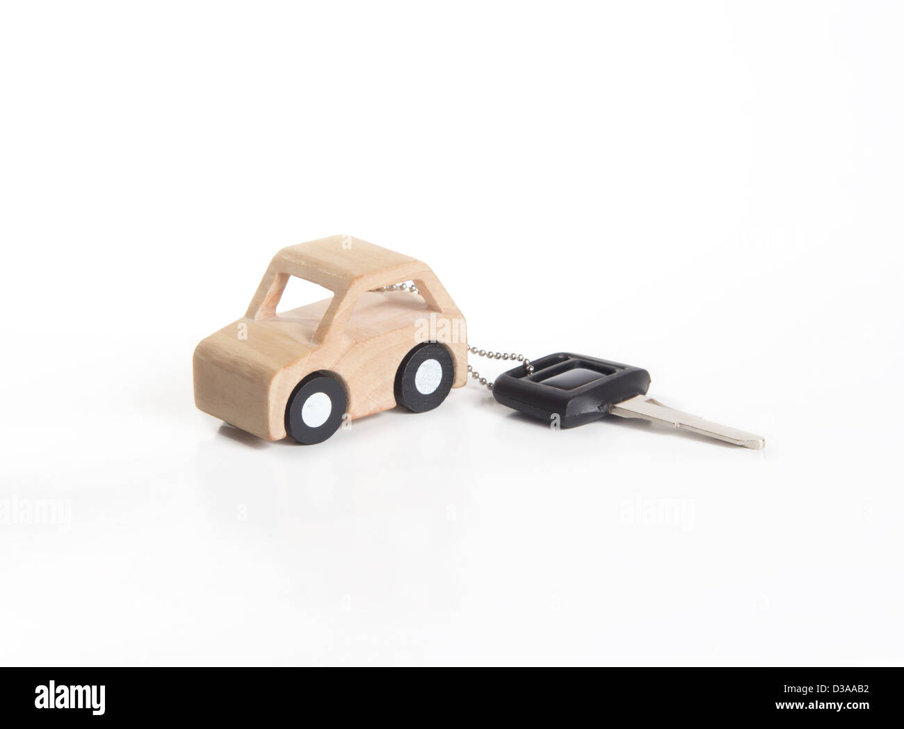 Key and Car wooden on white background Stock Photo - Alamy