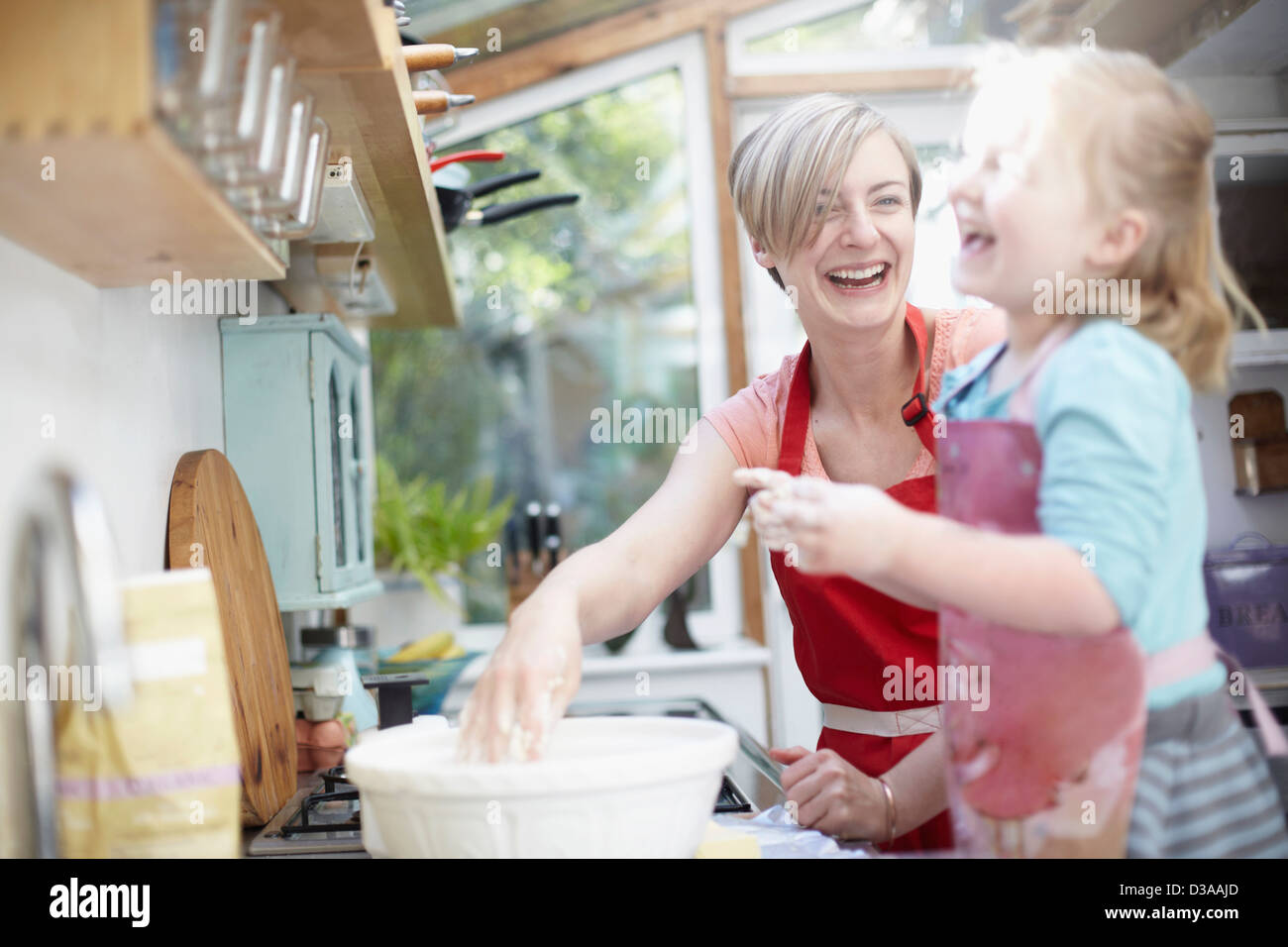 Mother and daughter baking together Stock Photo - Alamy