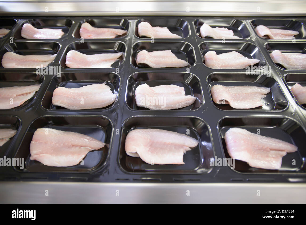 Food packaging manufacturing hi-res stock photography and images - Alamy