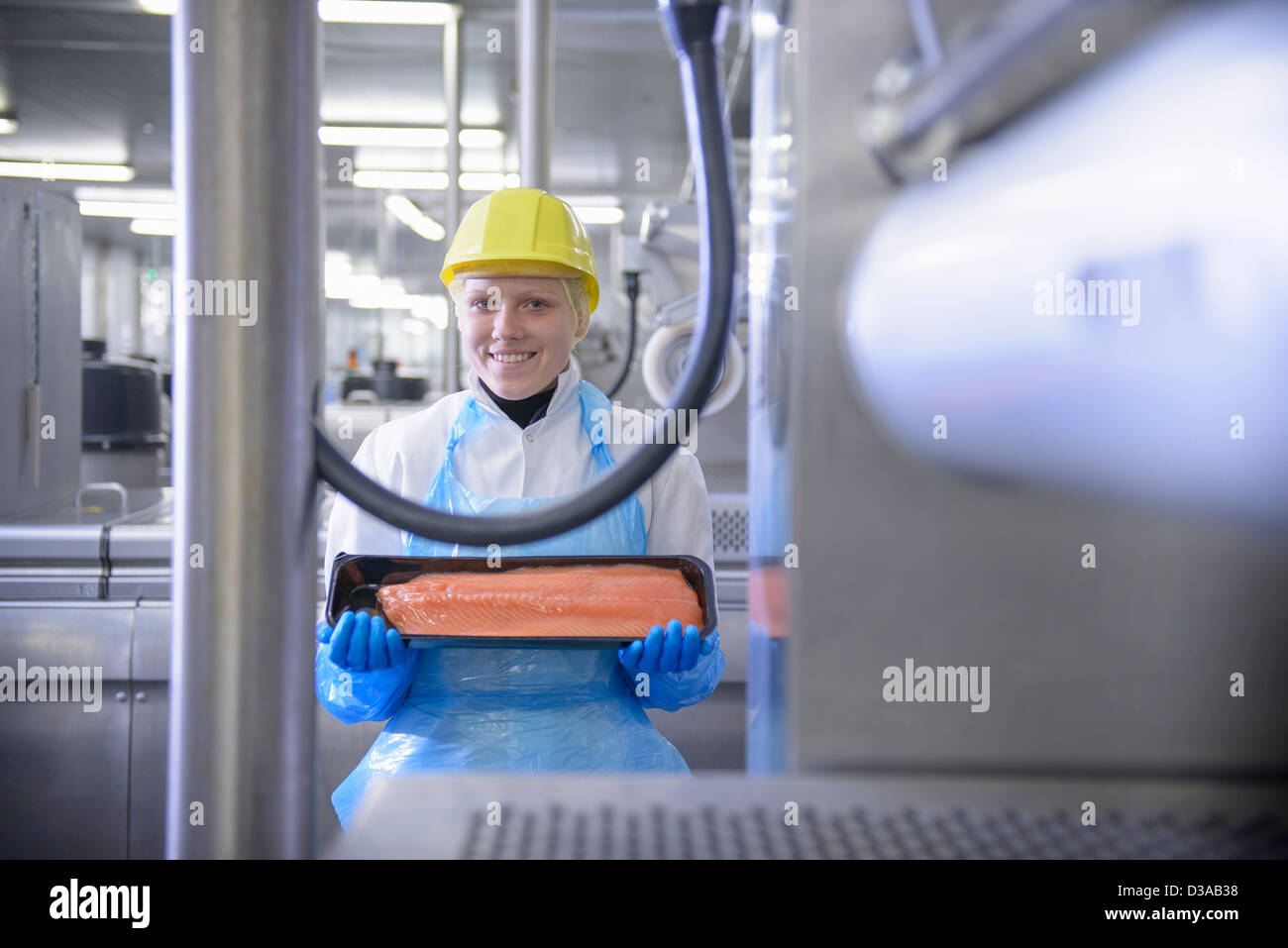 Salmon food factory women hi-res stock photography and images - Alamy