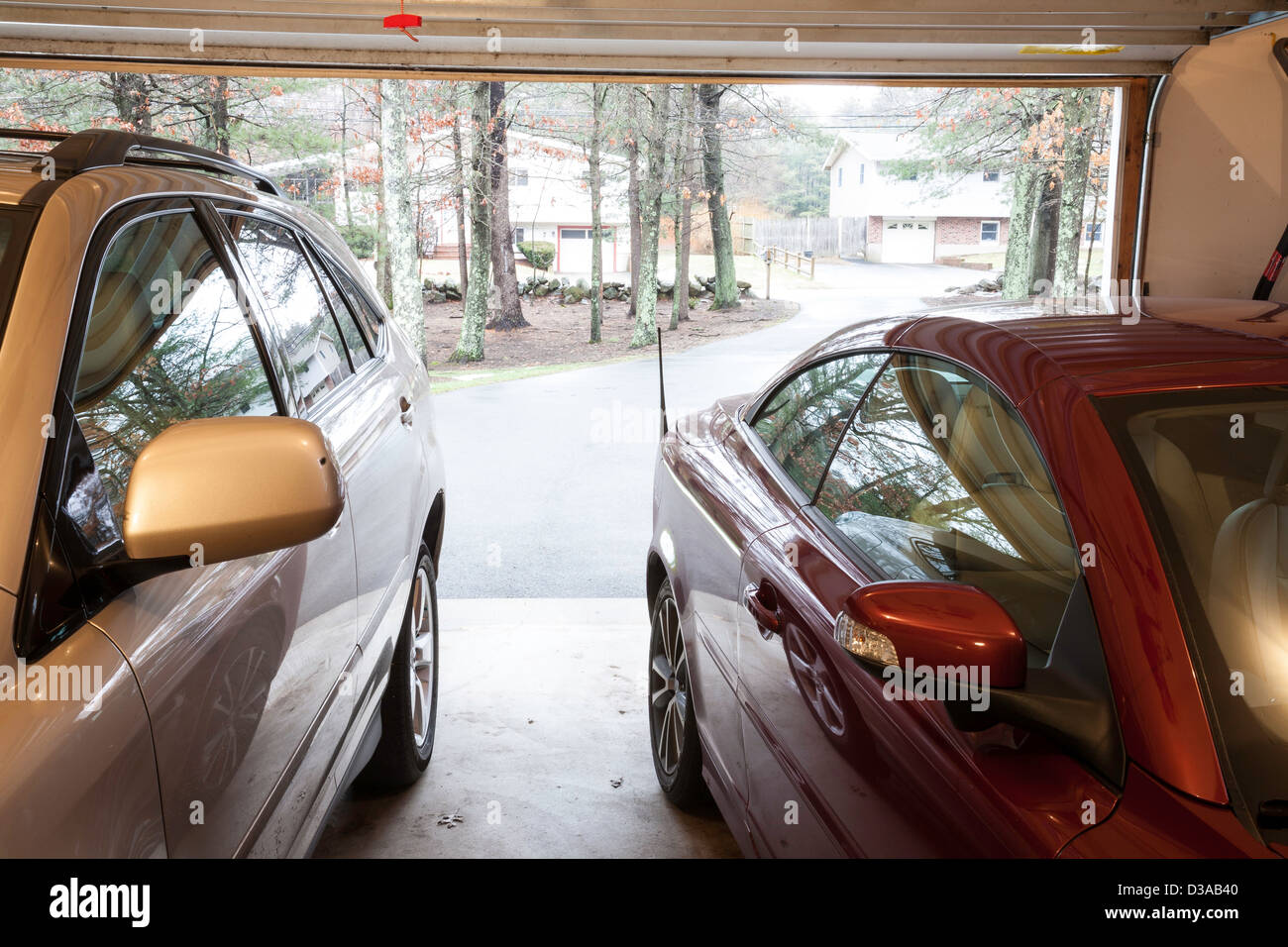Two cars driveway hi-res stock photography and images - Alamy