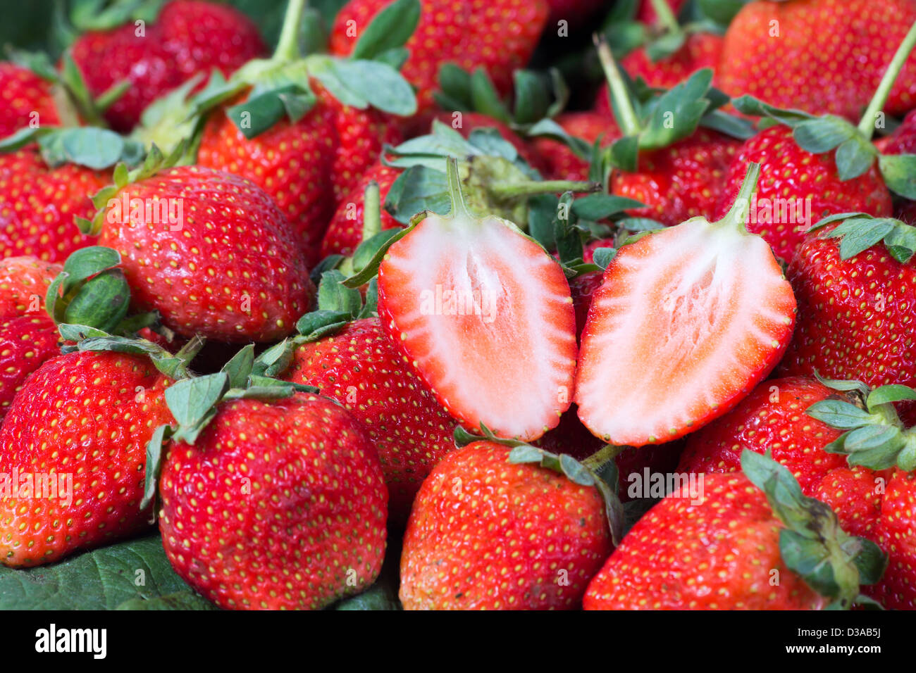 Background with bright red strawberry Stock Photo - Alamy