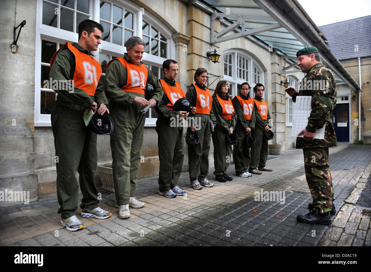 A recruiting officer with a chart of tests for potential recruits at ...