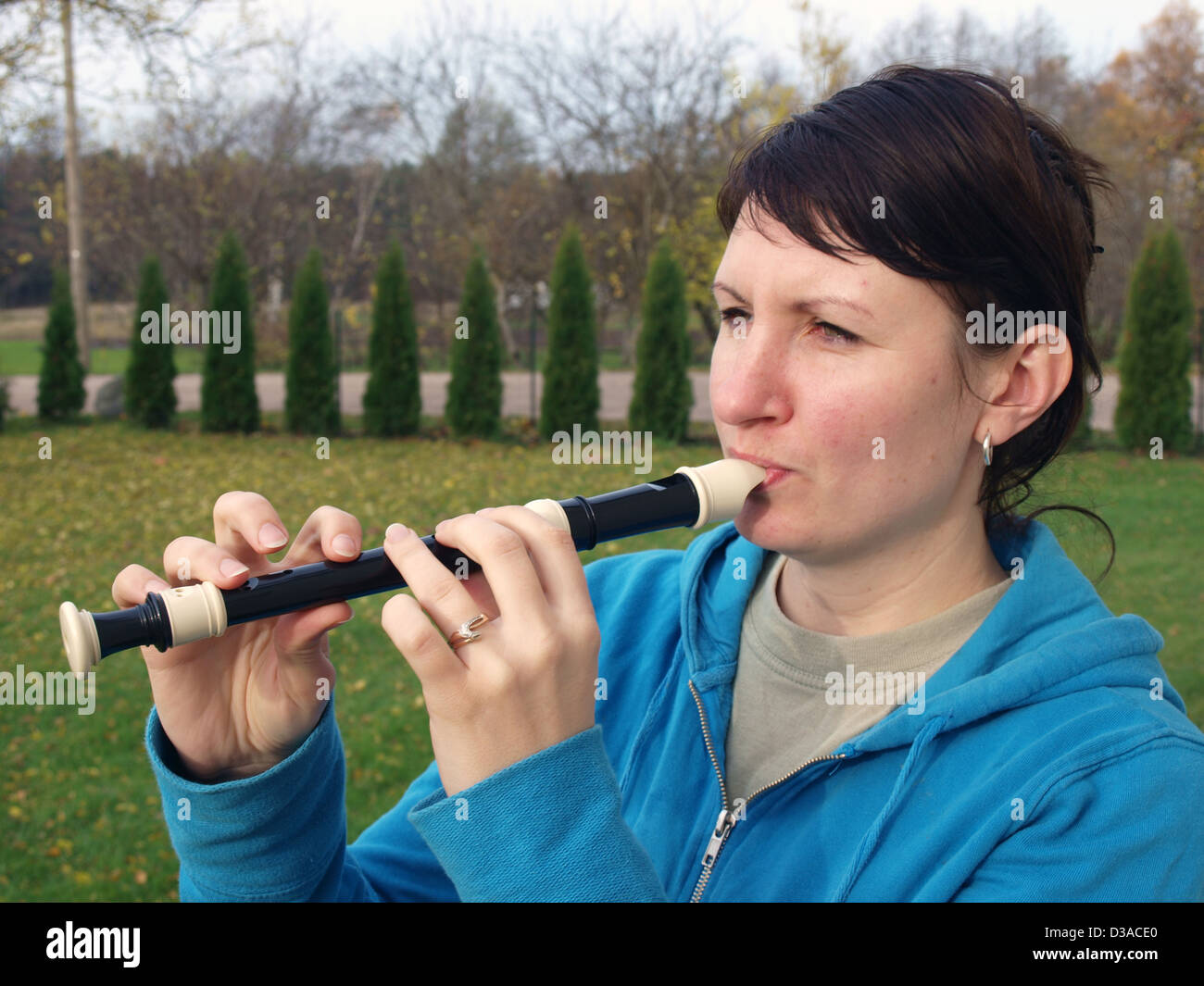 Young Woman Playing Flute High Resolution Stock Photography and Images ...