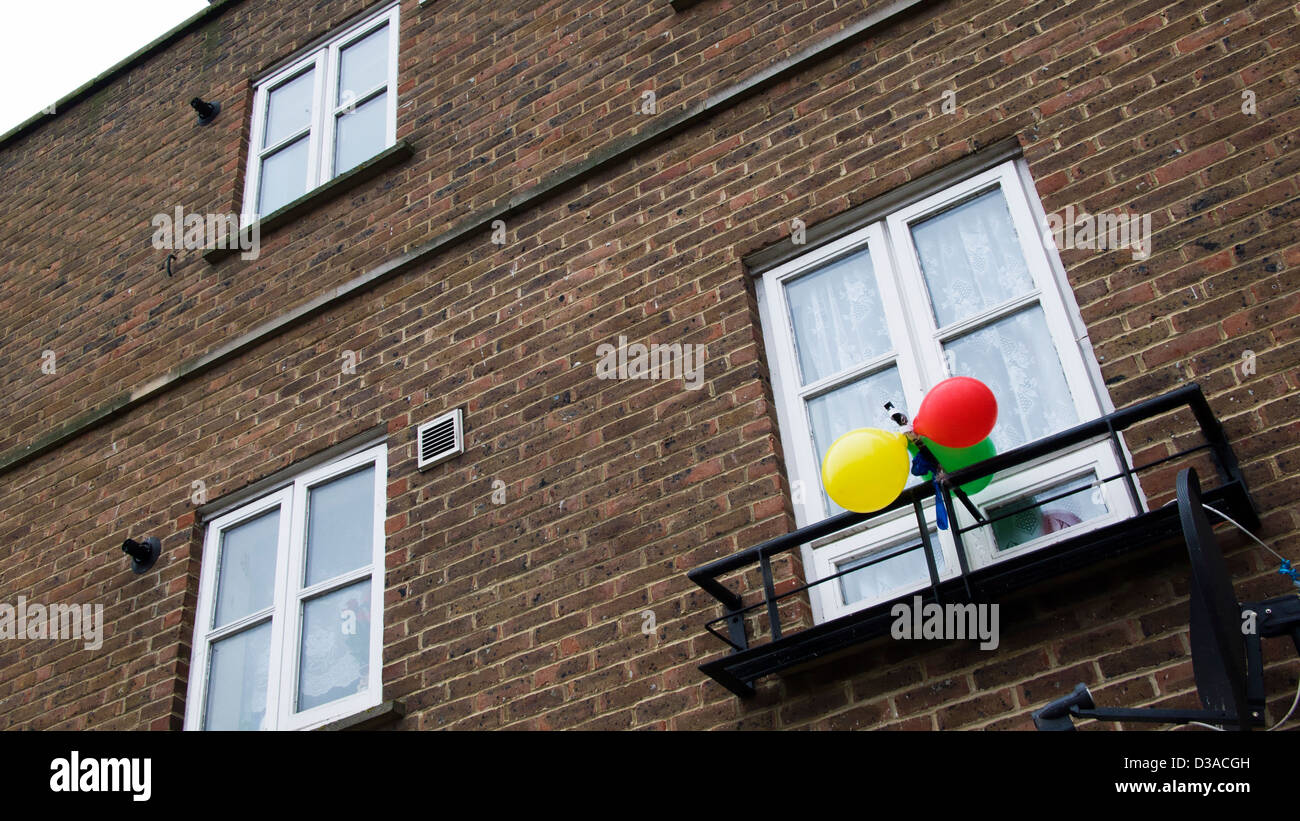 Balloons on balcony, Brighton, UK Stock Photo - Alamy