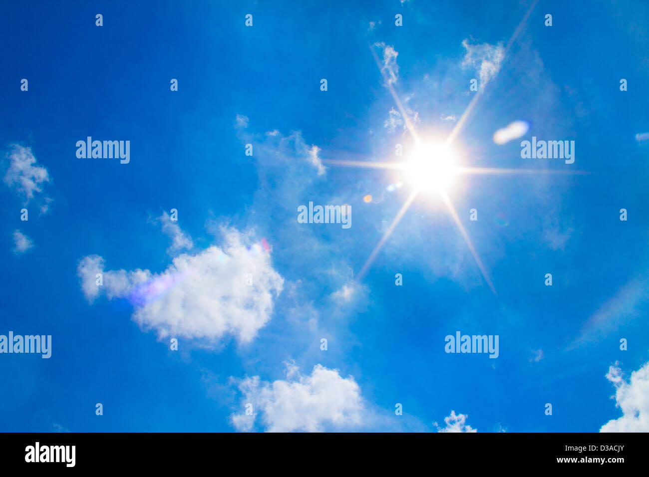 Clouds and sun during the day Stock Photo - Alamy