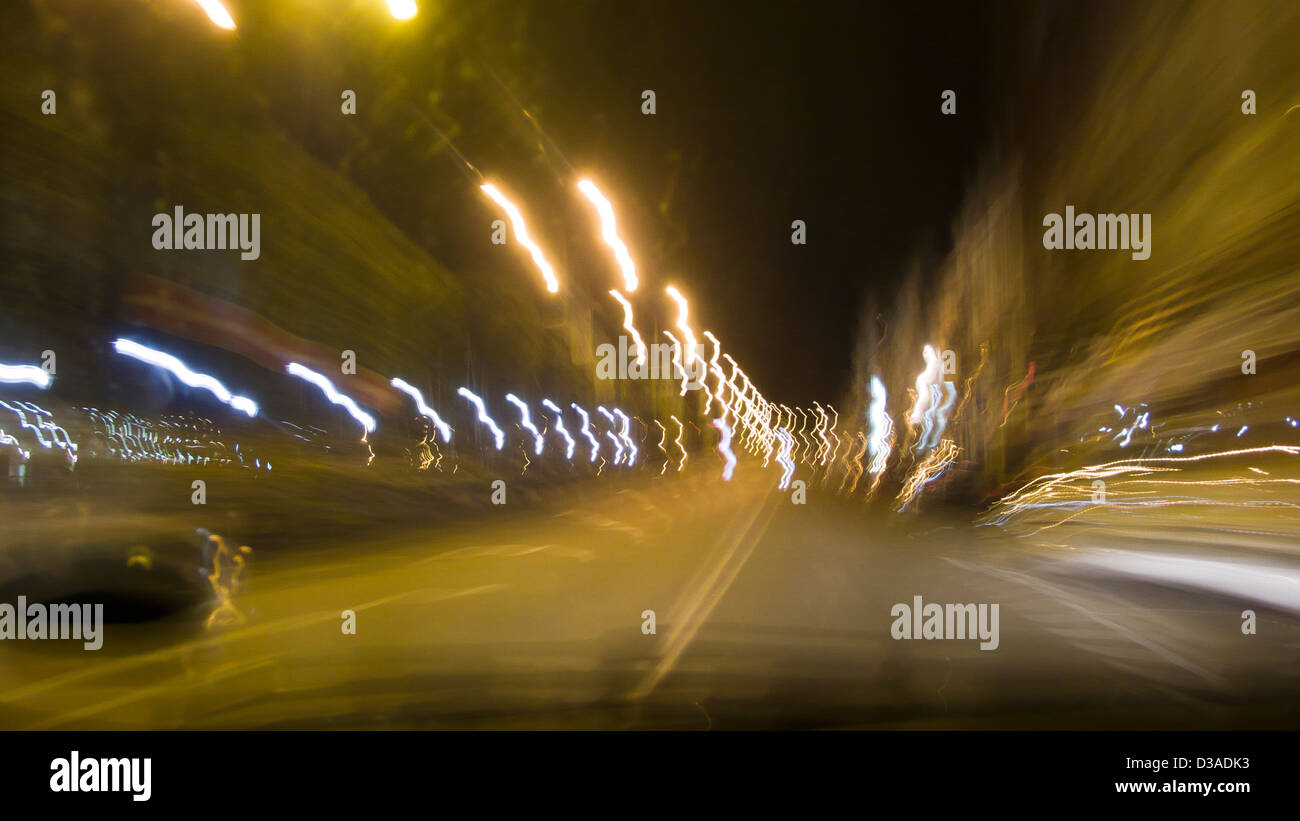 Blurred streetlights from speeding car Stock Photo - Alamy