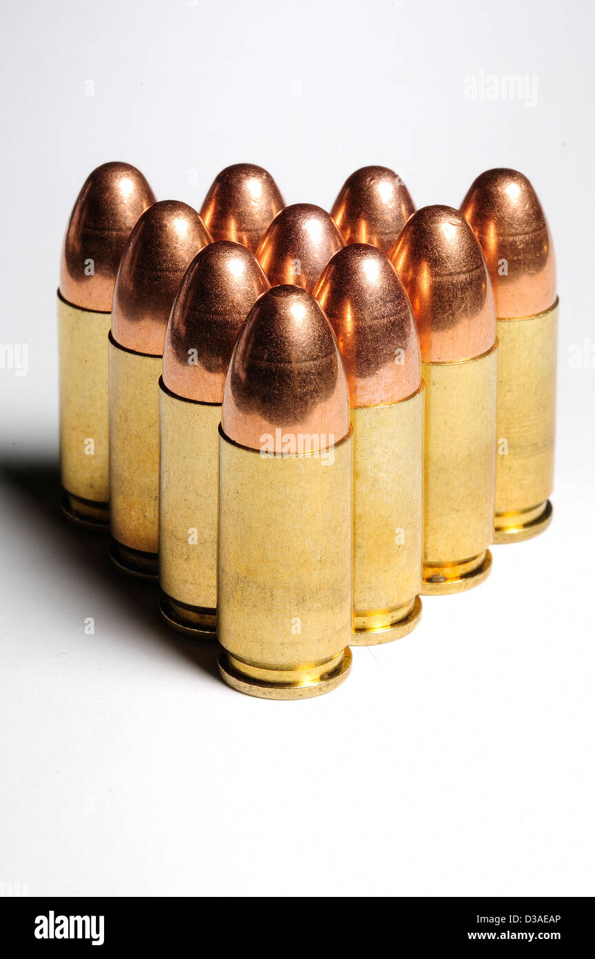9mm bullets shaped into triangle Stock Photo - Alamy