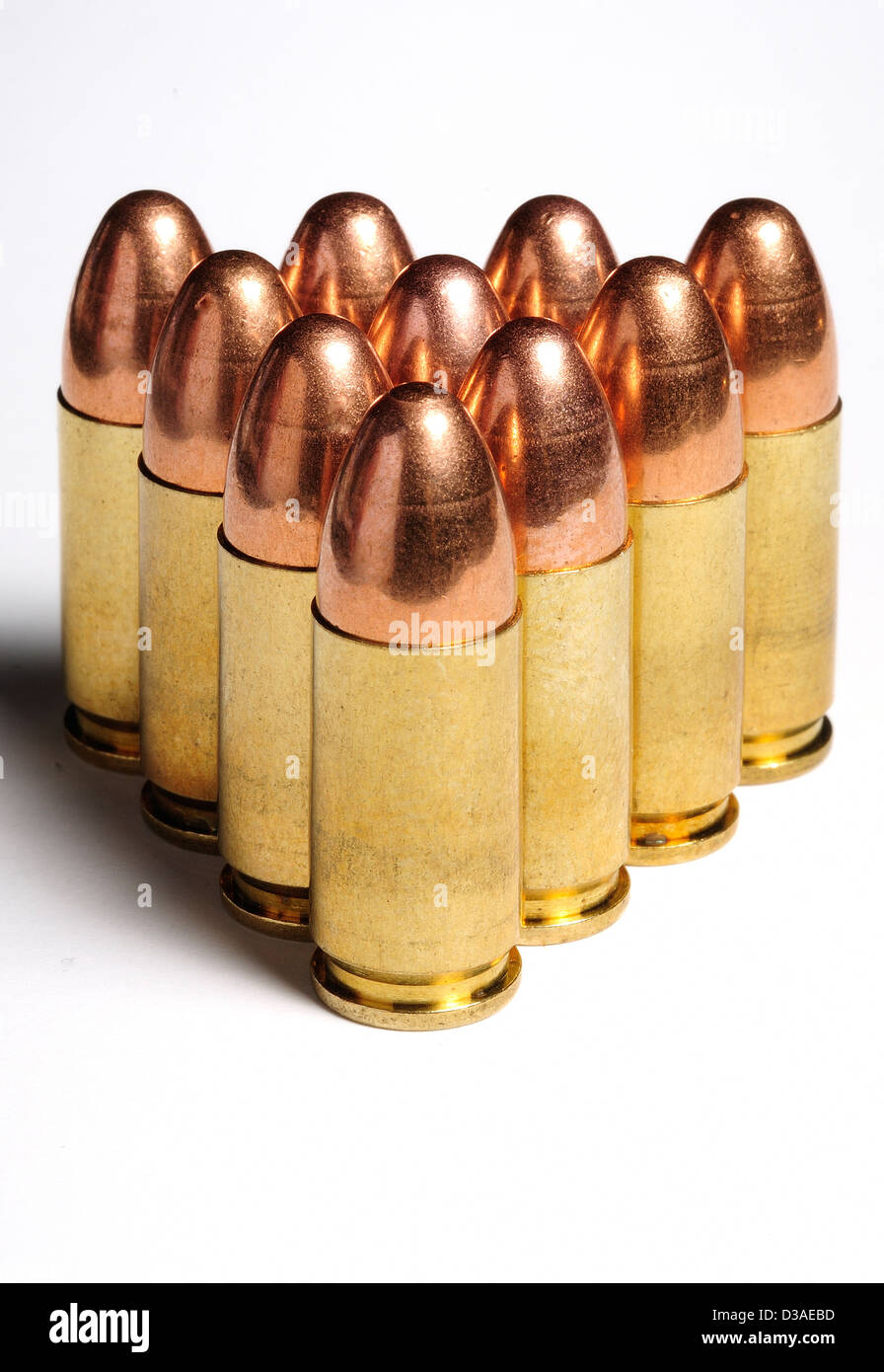 9mm bullets shaped into triangle Stock Photo - Alamy