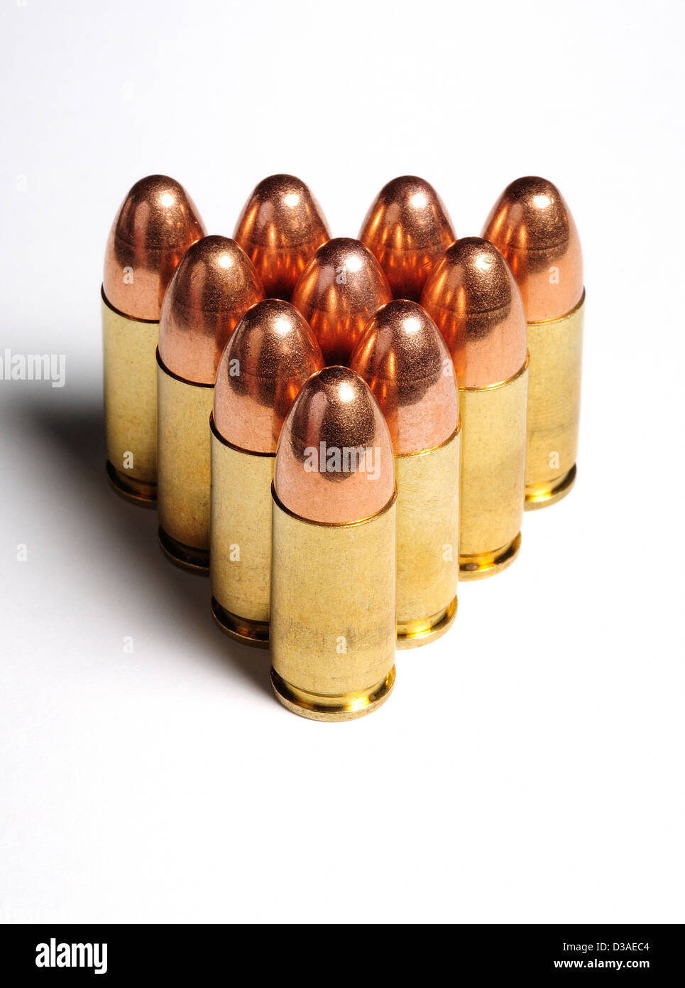 9mm bullets shaped into triangle Stock Photo - Alamy
