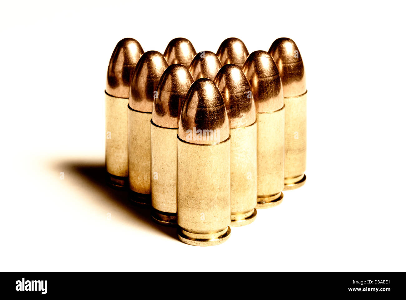 9mm bullets shaped into triangle Stock Photo - Alamy