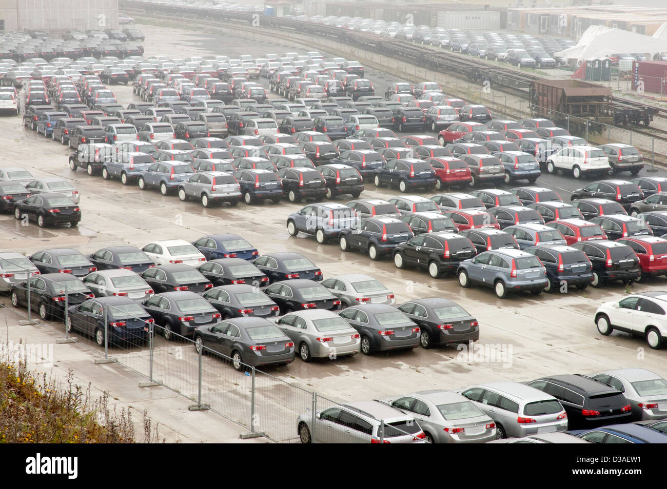 Brand new cars in a harbour Stock Photo - Alamy