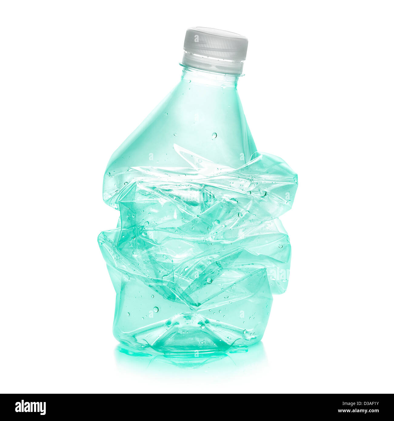 Squashed plastic bottle in order to recycle in green color. Clipping ...
