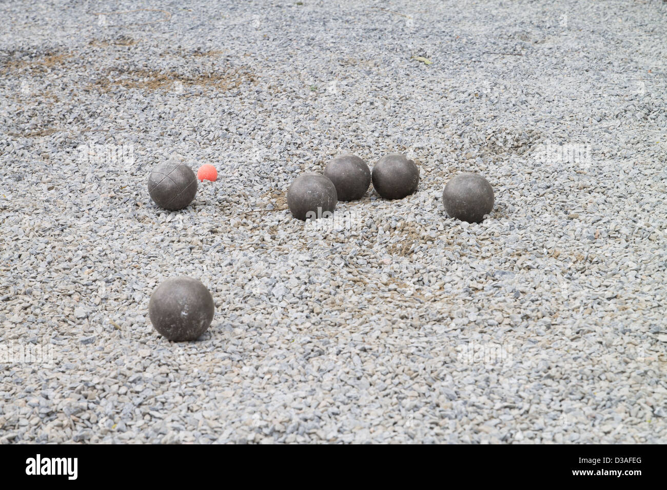 Playing Petanque with cochonnet orange color Stock Photo - Alamy