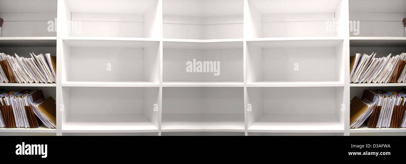 Shelf full of folders and files in an office Stock Photo - Alamy