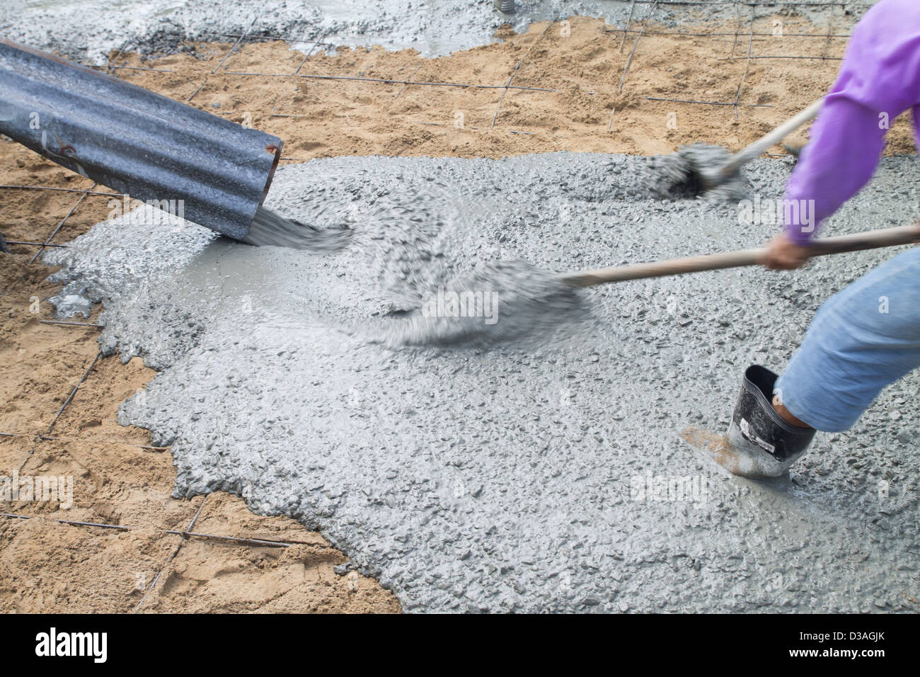 Concrete pouring during commercial concreting floors of buildings in ...