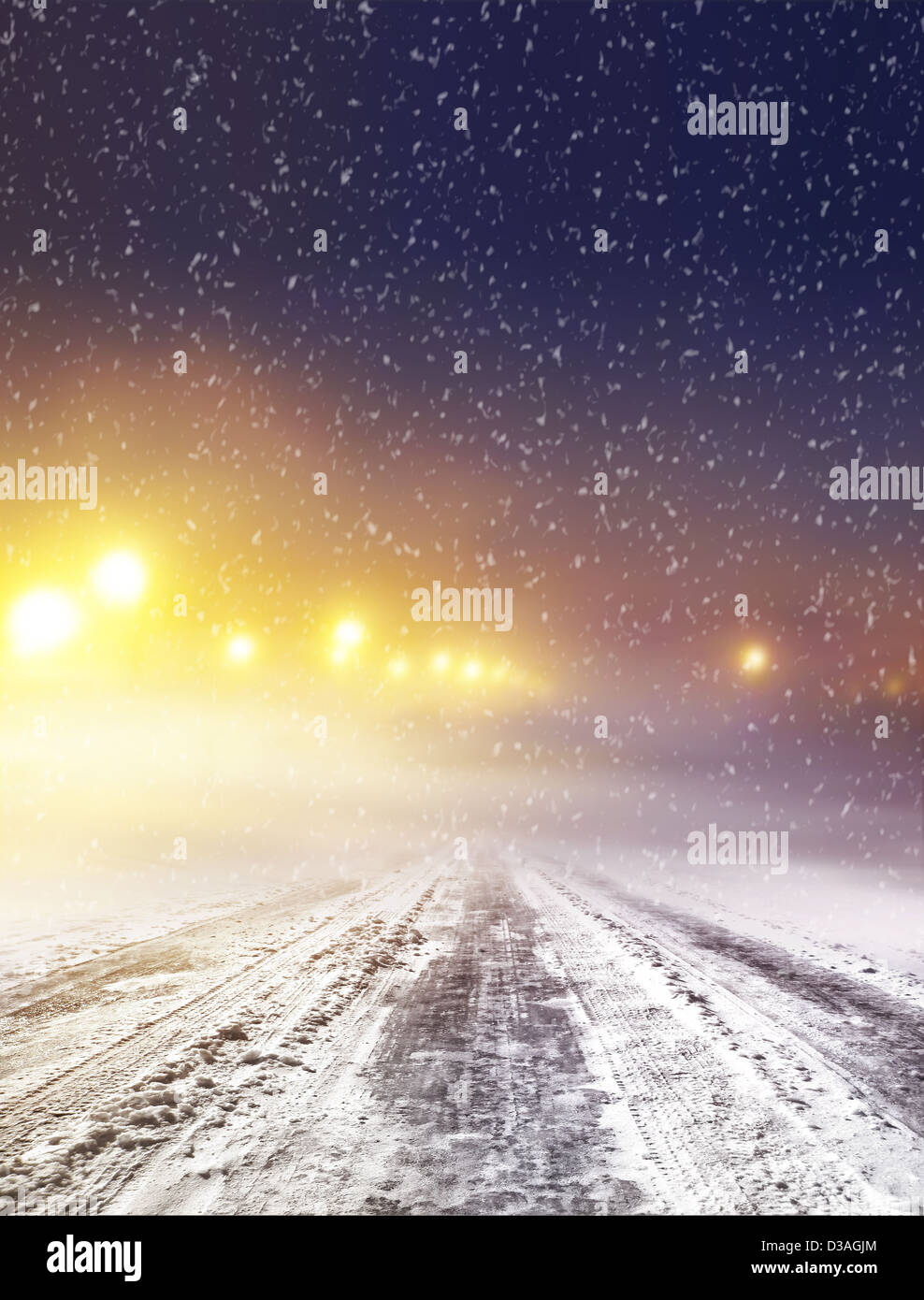 Snow covered winter road with shining streetlights at night Stock Photo ...