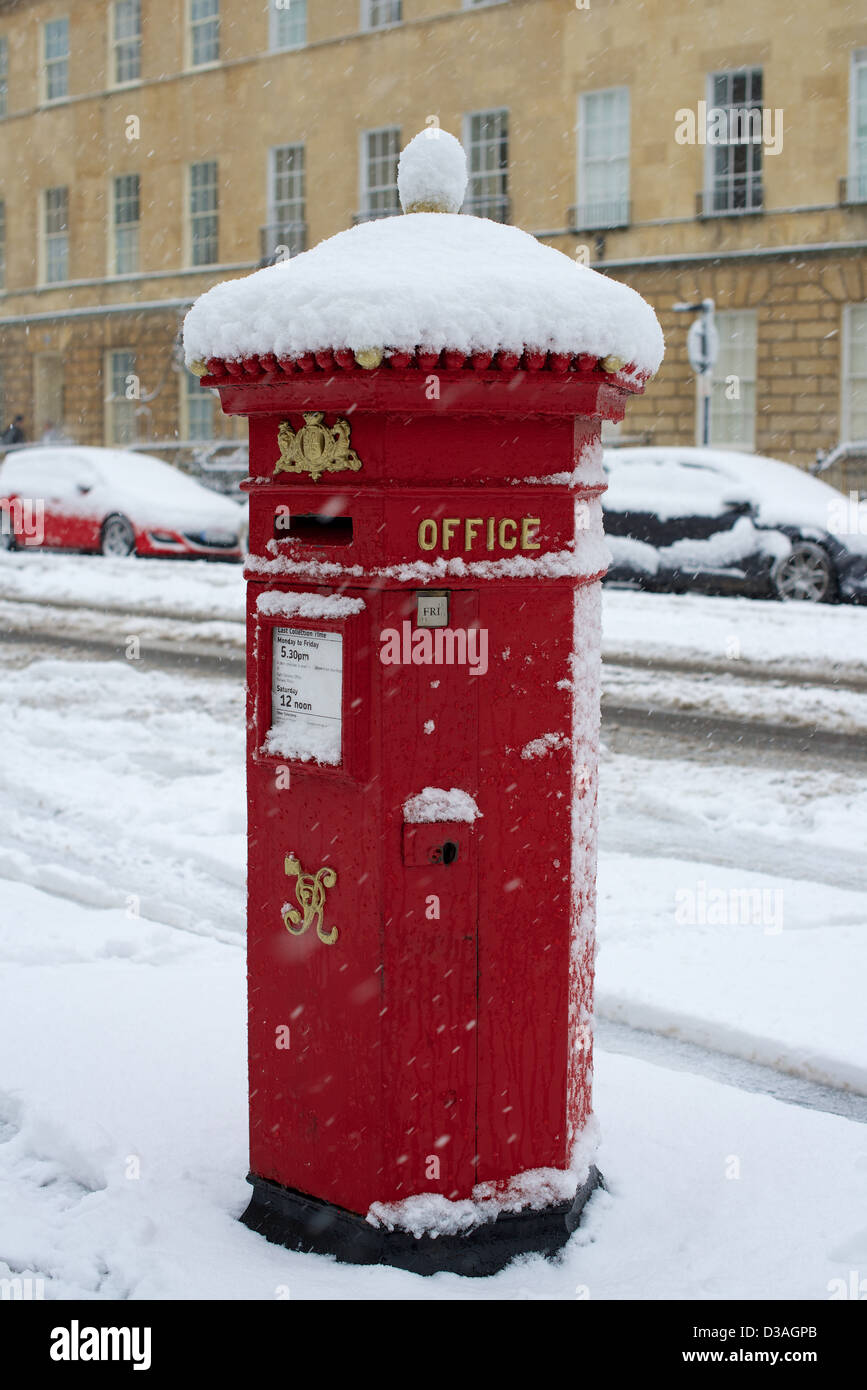 Red Victorian Royal Mail Post Box in Bath Somerset covered in snow ...