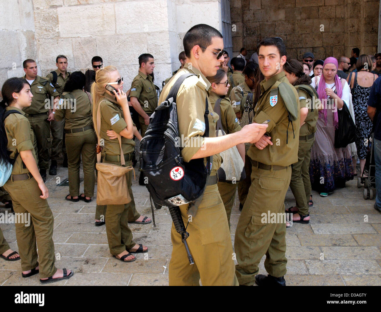 Young Israeli soldiers on cell phones in Jerusalem, Israel Stock Photo ...