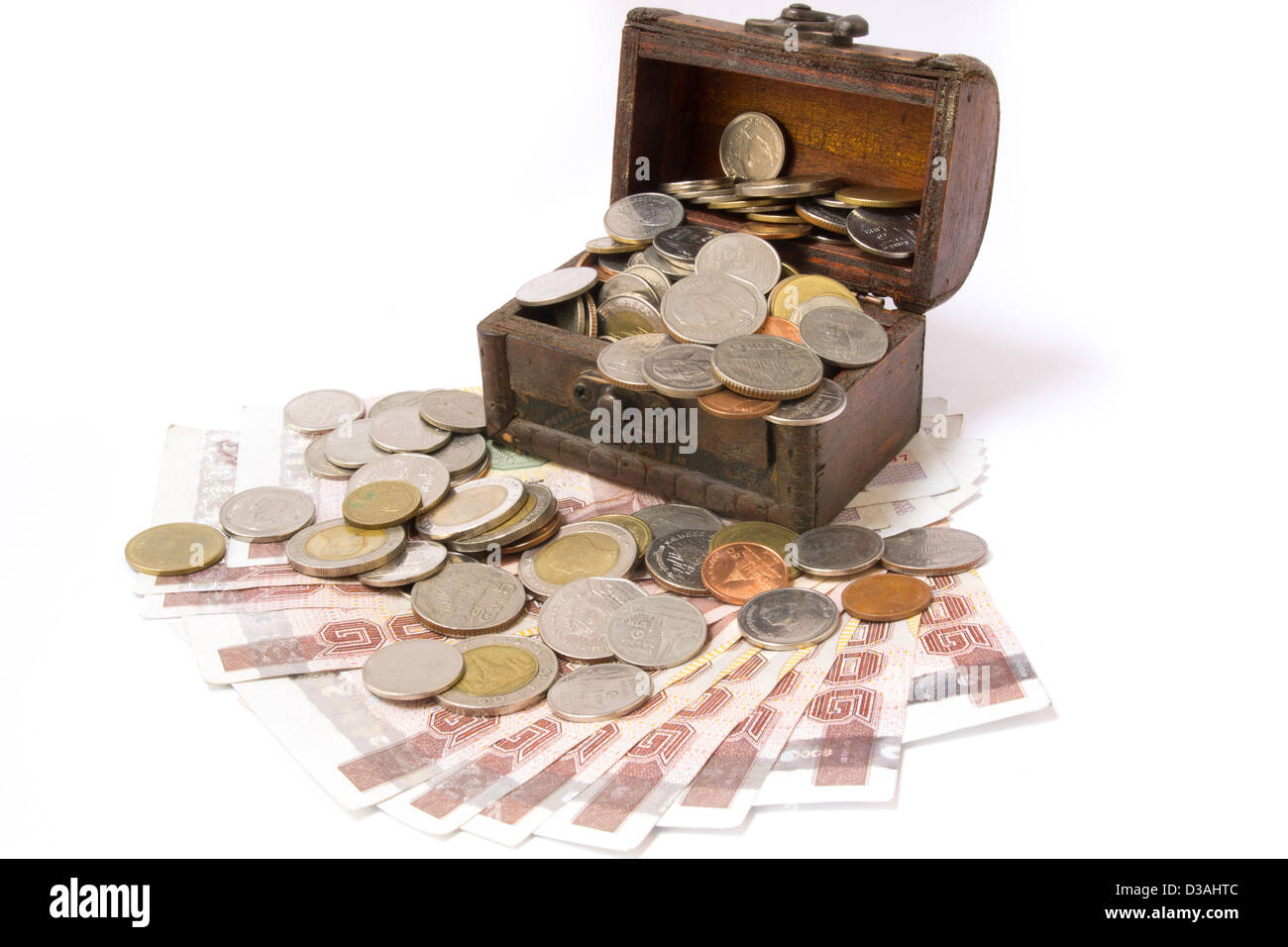 Wooden chest of money, isolated over white background Stock Photo - Alamy