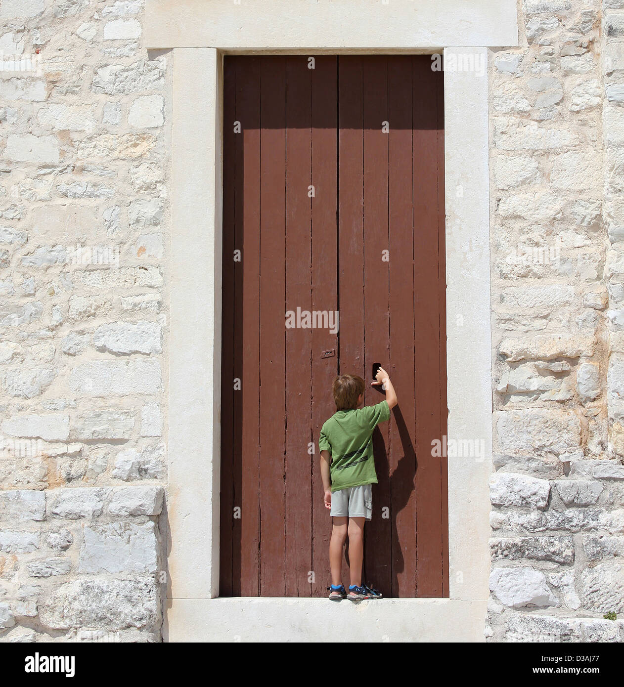 Child street door hi-res stock photography and images - Alamy