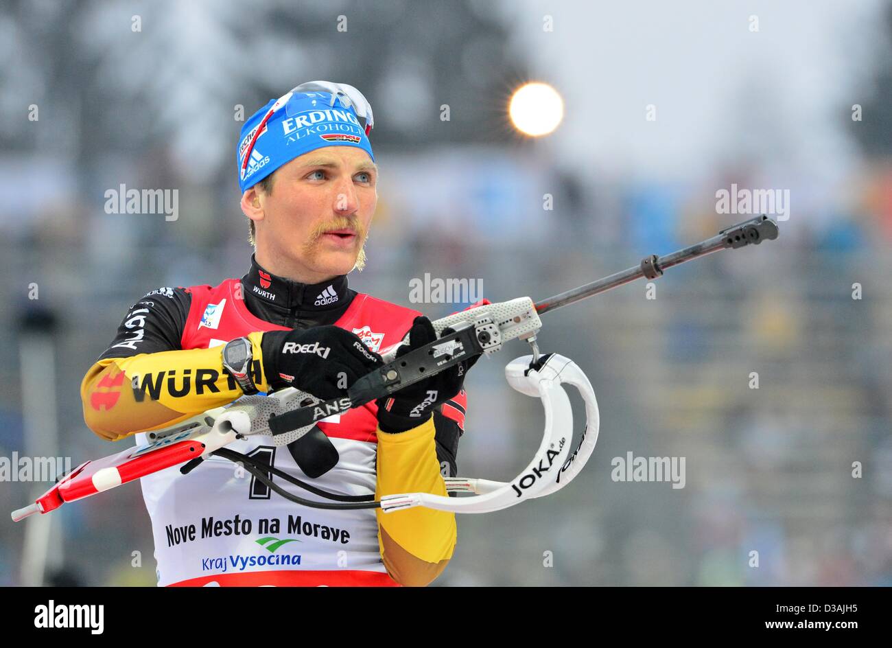 Erik Lesser of Germany competes at the shooting range during the men's ...
