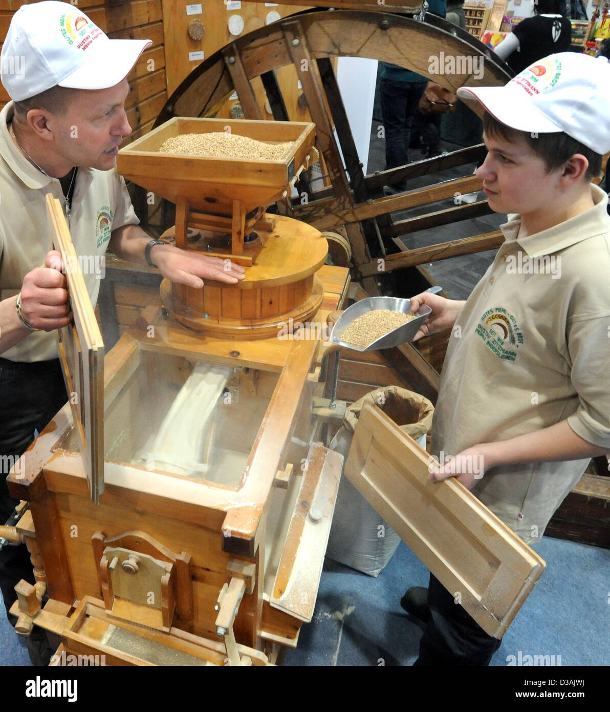 Farmer Stephan Rohr (L) and young miller Daniel Kellner from Muehle ...