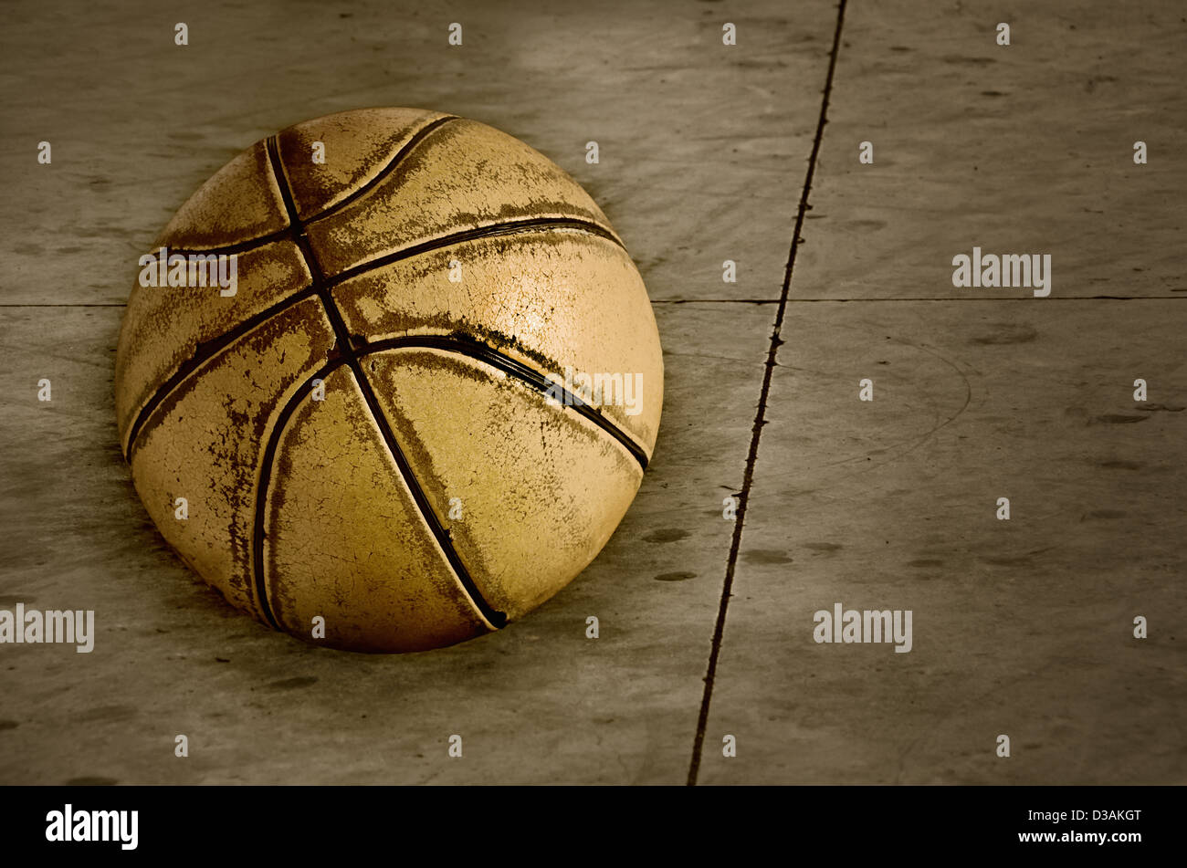 Basketball old ball on grunge concrete background Stock Photo - Alamy
