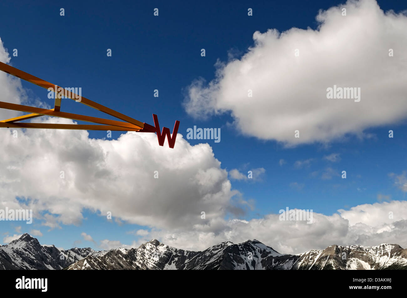 marker sign pointing west westerly westward canadian rockies sulphur ...