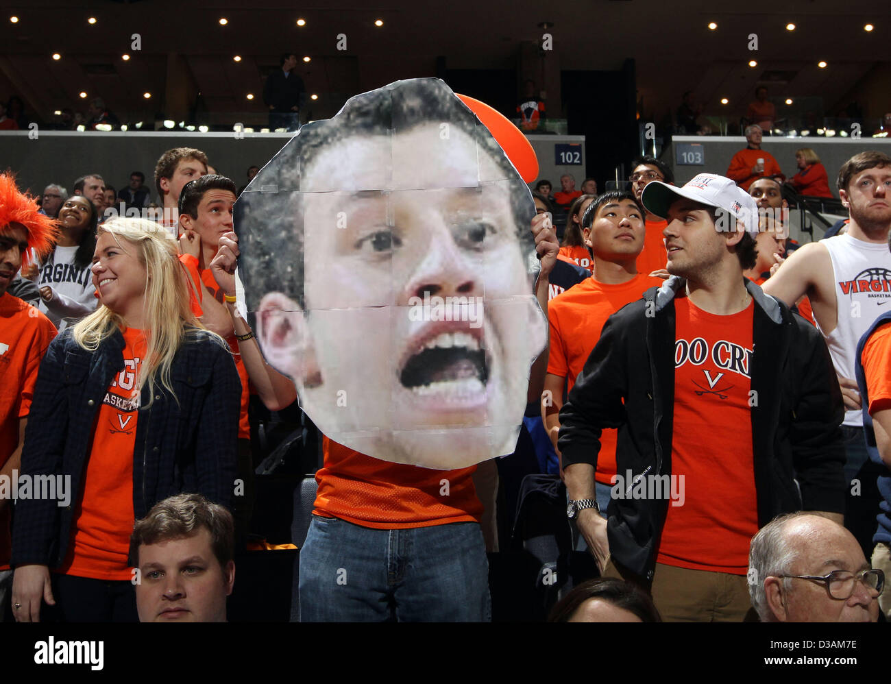 Feb. 7, 2013 - Charlottesville, Va, USA - A fan holds up a cut out of ...