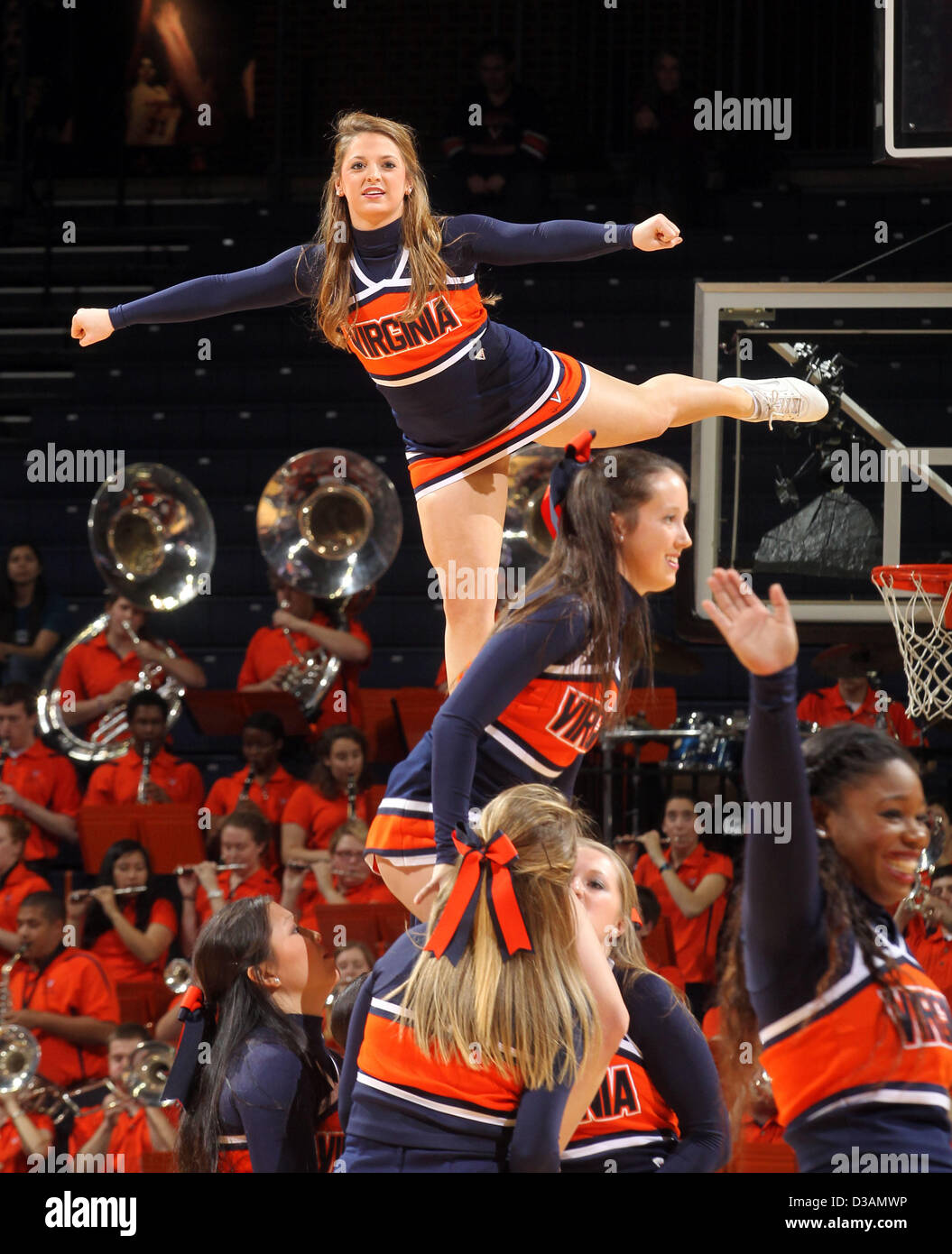 Cheerleaders perform during basketball game hi-res stock photography ...