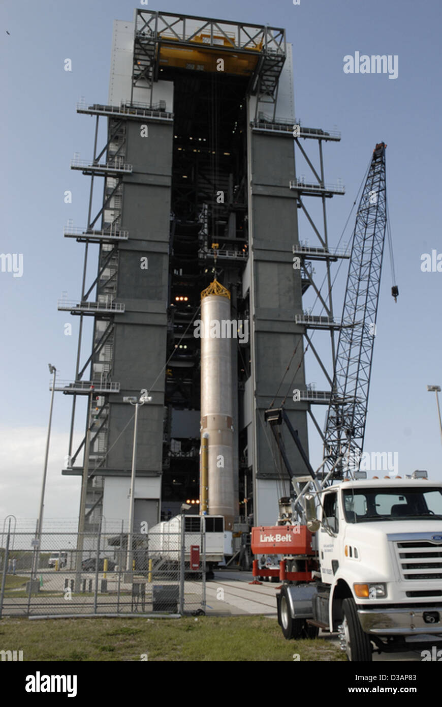 The Atlas V rocket's first stage is moved to the vertical integration ...
