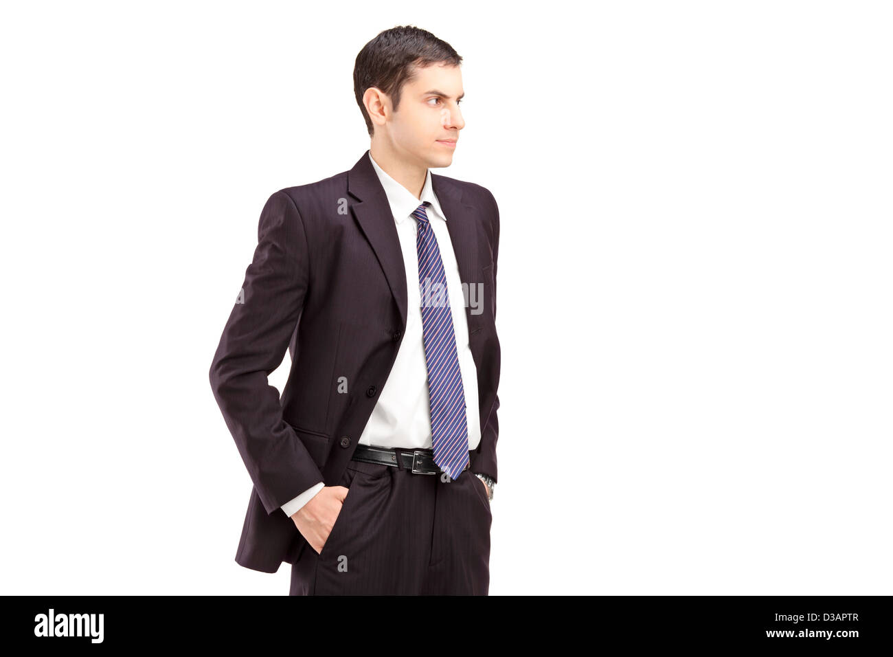 Angry man in suit with hands in pockets shot during an argue isolated ...