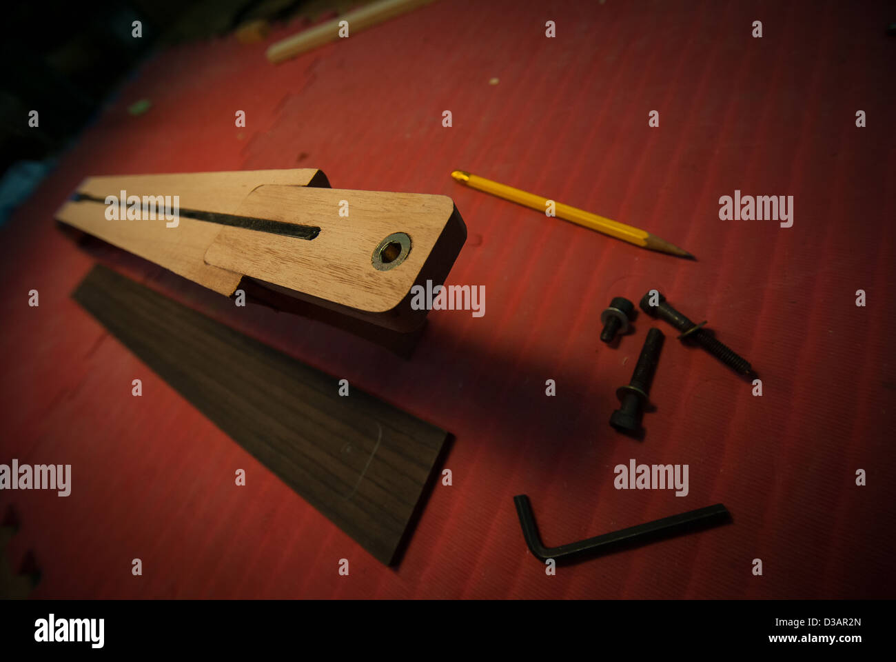 Photograph of the fretboard and neck of guitar with associated tools ...