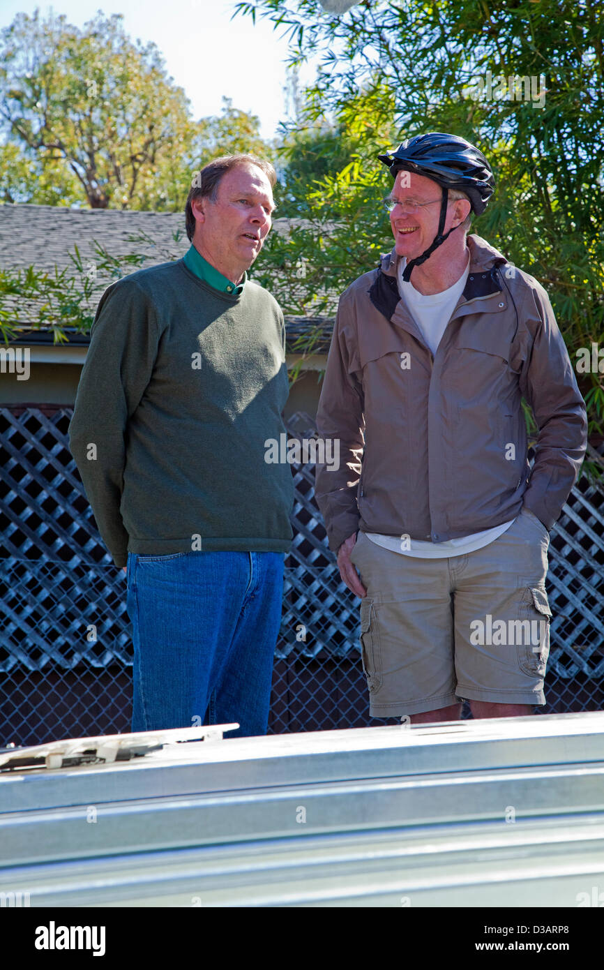 Ed Begley Jr with Donald Wheeler, steel framing contractor. Framing of ...