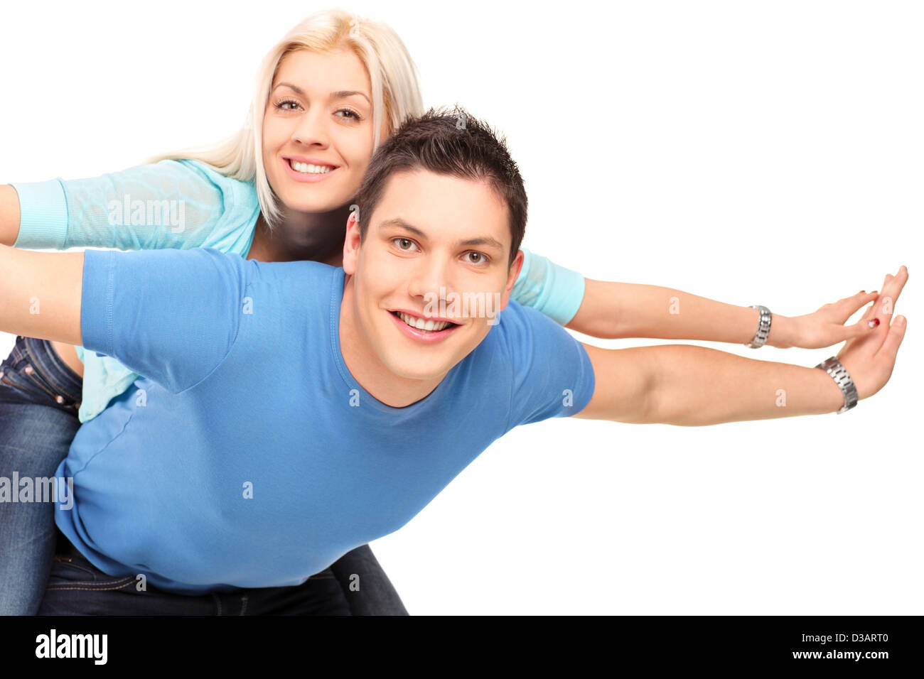 Young happy couple posing piggyback isolated on white background Stock ...